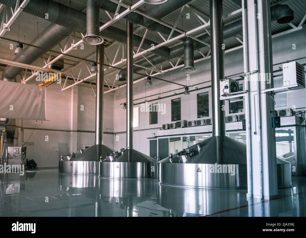 Modern interior of a brewery mash vats metal containers Stock Photo - Alamy