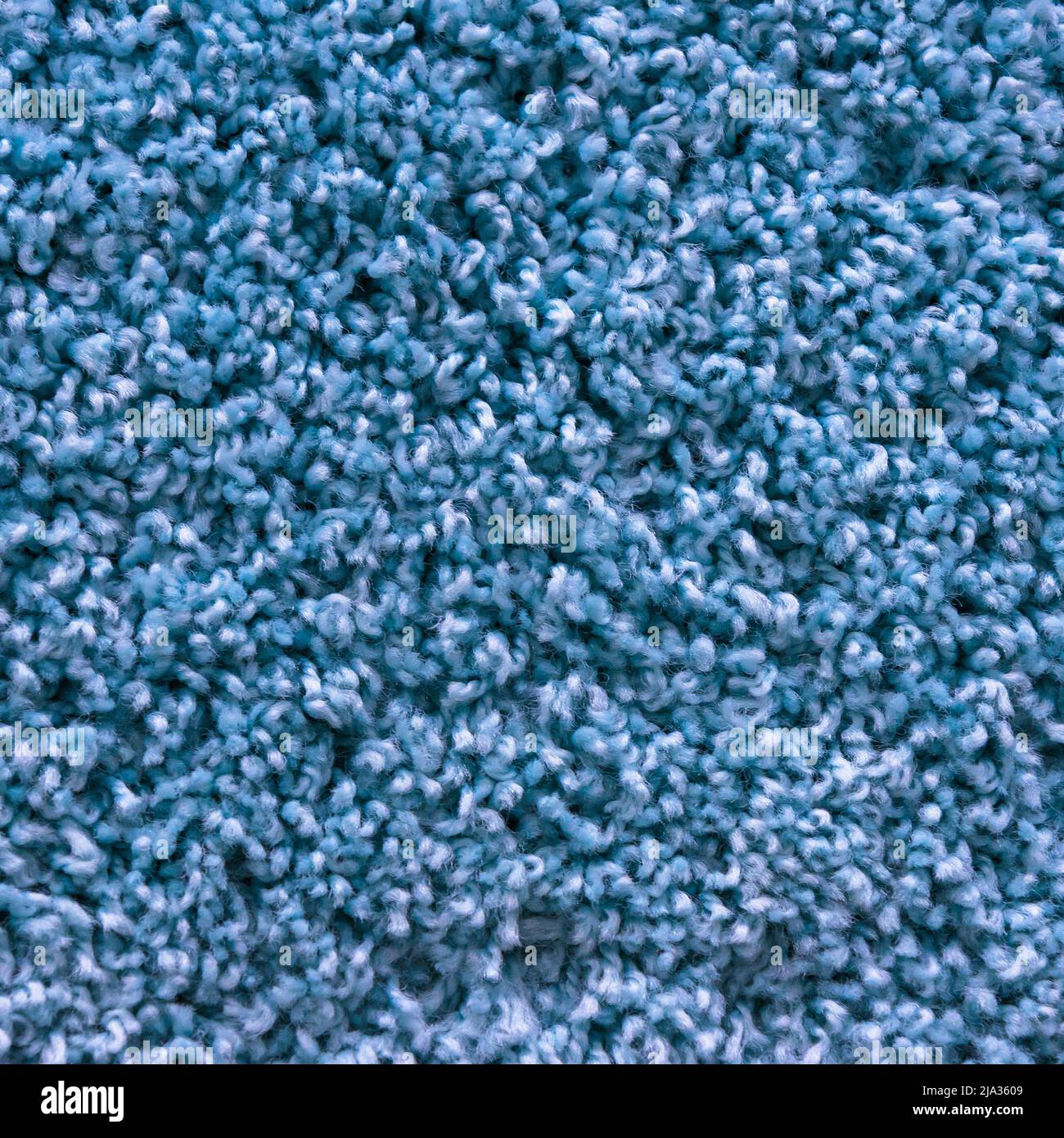 Carpet texture. Cyan carpet background close up Stock Photo - Alamy