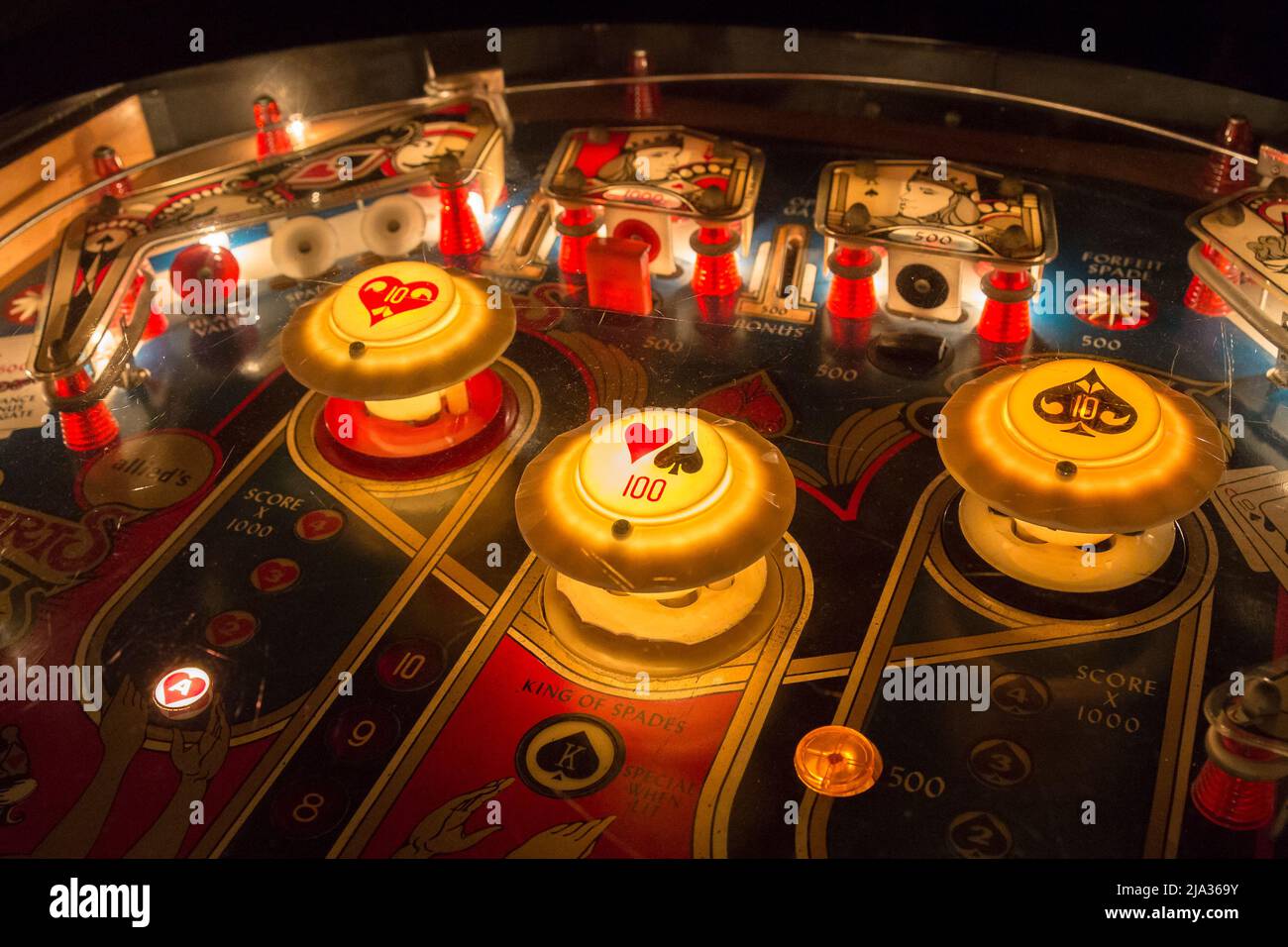 Pinball table close up view of vintage game machine Stock Photo - Alamy