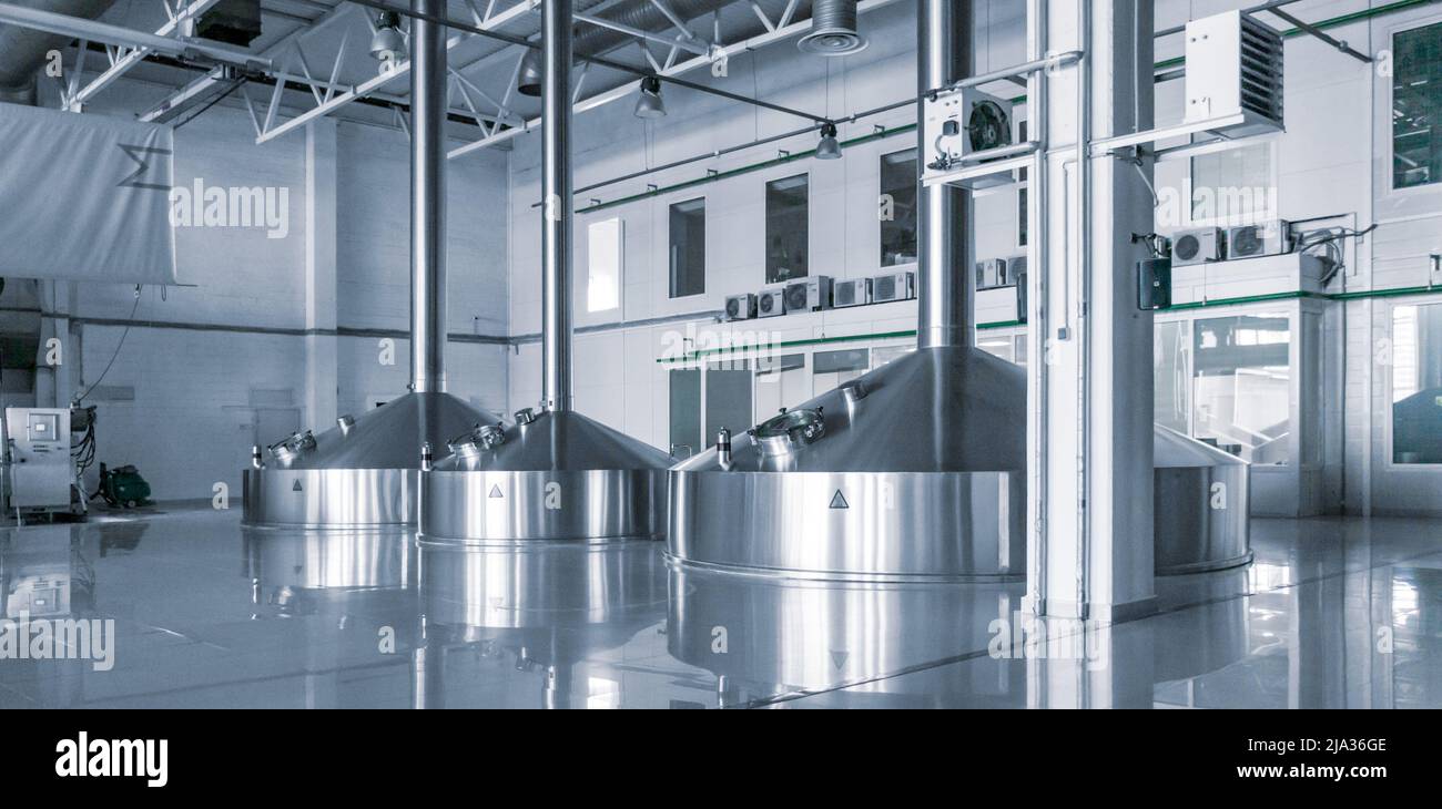Modern interior of a brewery mash vats metal containers Stock Photo - Alamy