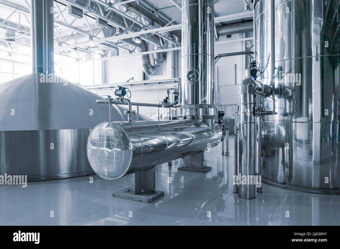 Modern interior of a brewery mash vats metal containers Stock Photo - Alamy