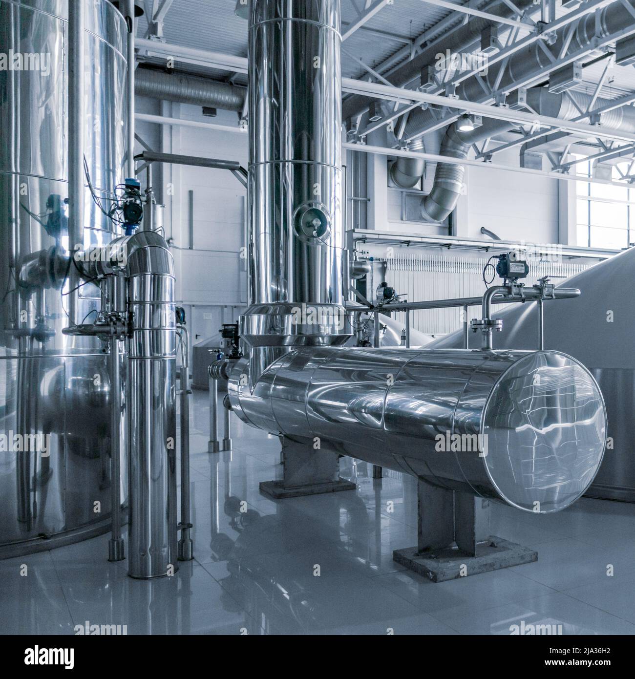 Modern interior of a brewery mash vats metal containers Stock Photo - Alamy