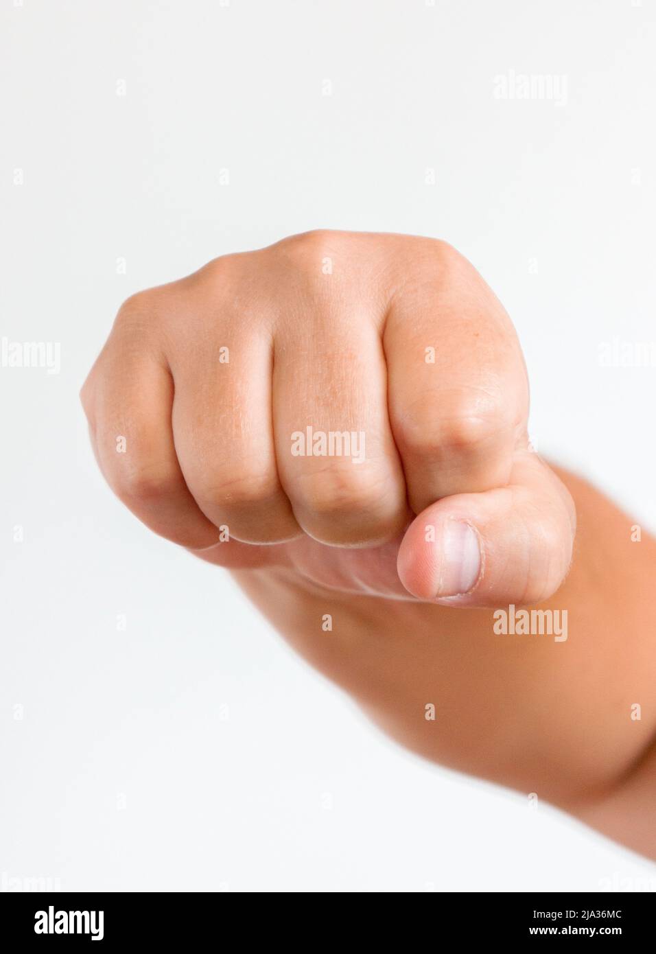 Hand gesture. Man clenched fist ready to punch, close-up, copy space ...