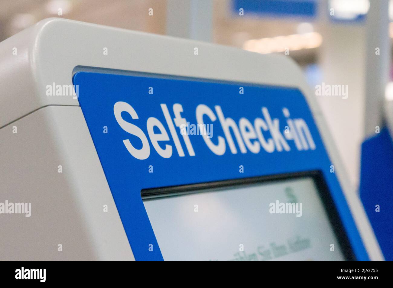 Check-in kiosk tablet upon arrival at front desk of airport Stock Photo ...