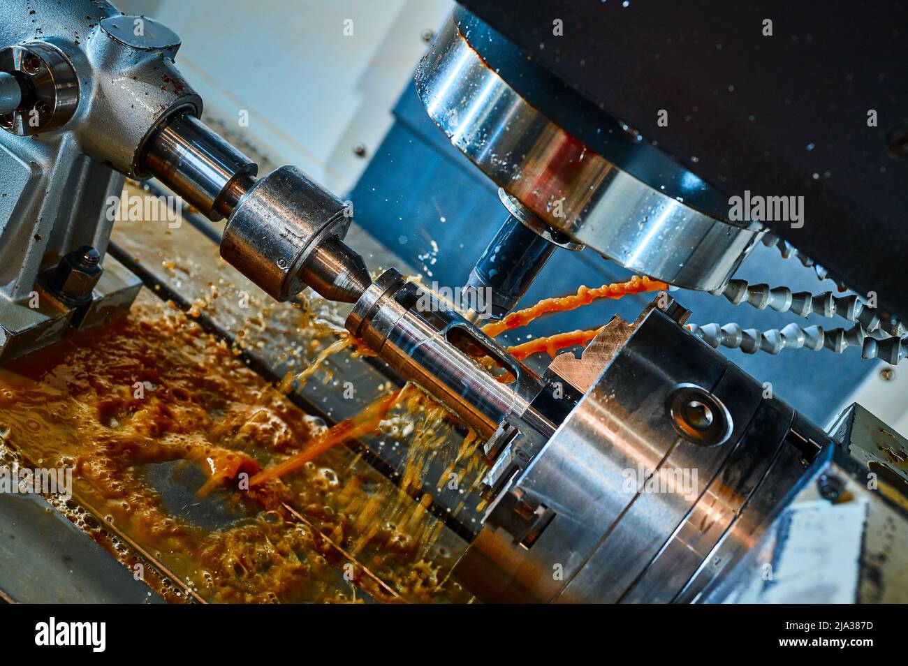 Processing metal detail with lathe machine tool in workshop Stock Photo ...