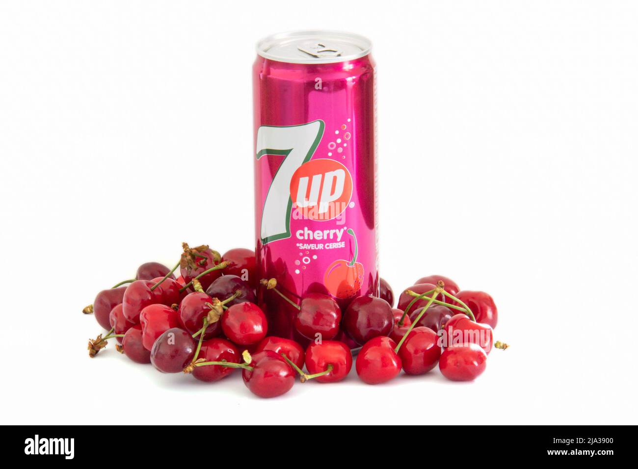 can of seven up with cherries on white background Stock Photo - Alamy