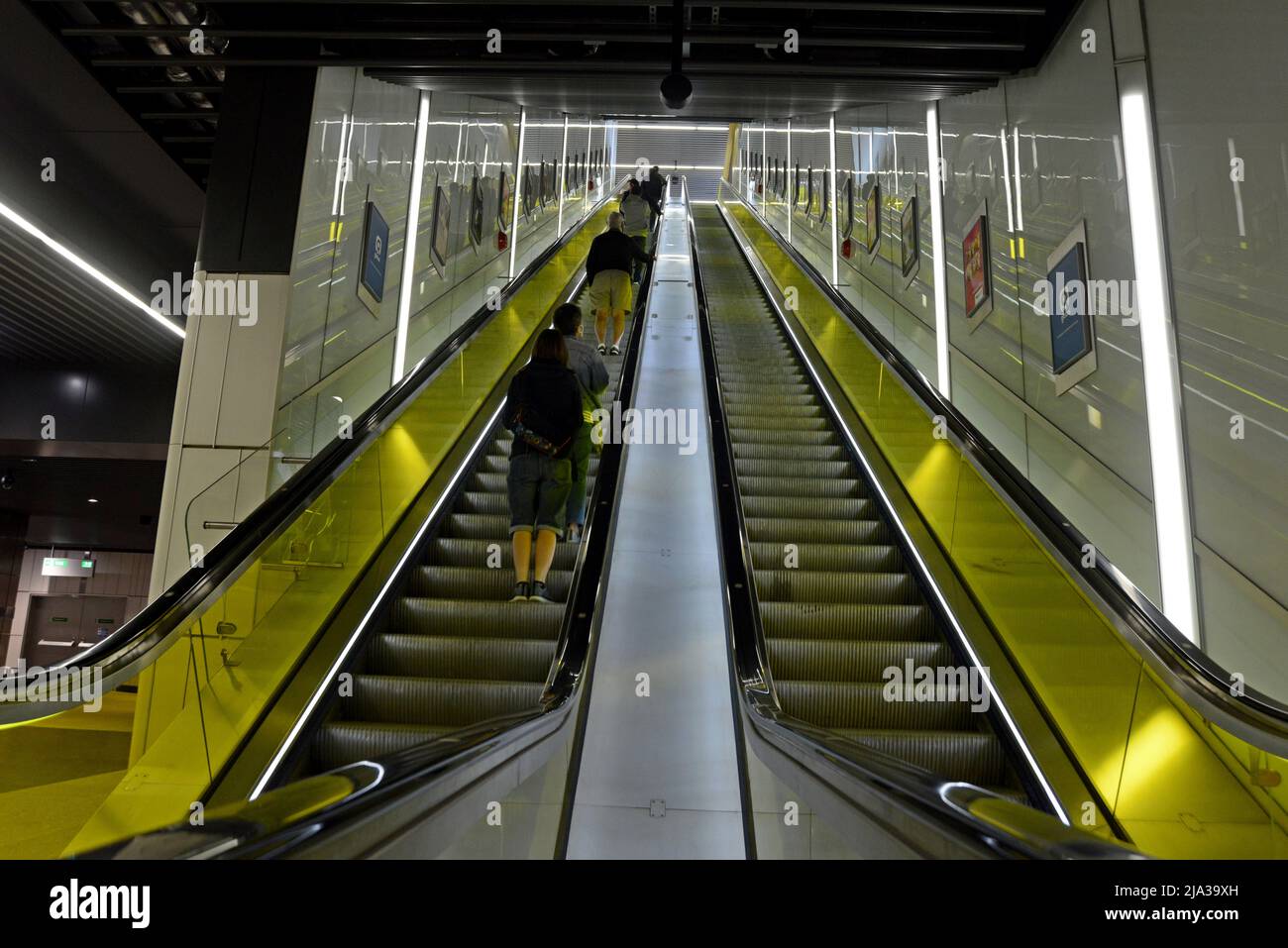 Passengers using the escalators at the new Canary Wharf Crossrail ...