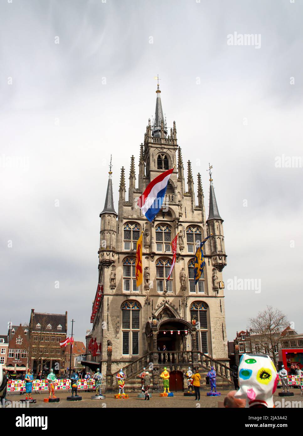 Flags on the ancient town hall at the Markt of Gouda during celebration ...