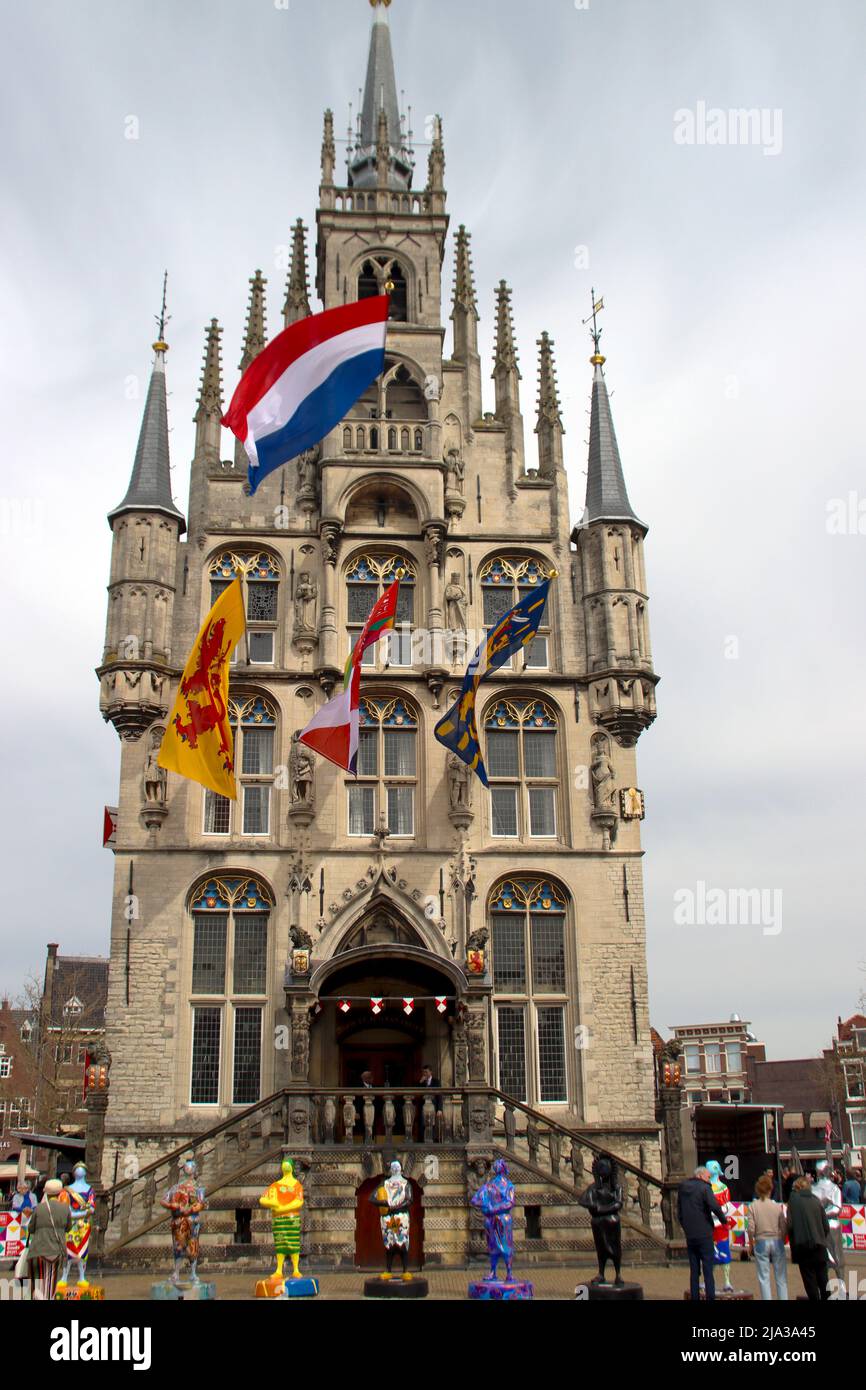 Flags on the ancient town hall at the Markt of Gouda during celebration ...