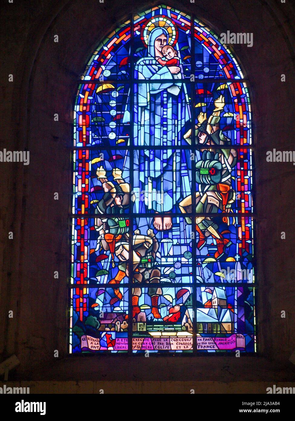 paratrooper in the stained glass in church of SAINTE-MÈRE-EGLISE in ...