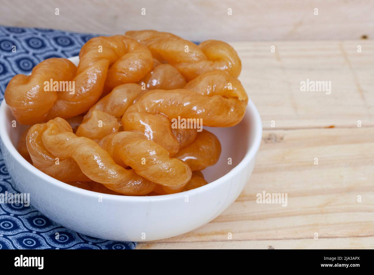 Delicious, golden, syrup drenched South African traditional koeksisters ...