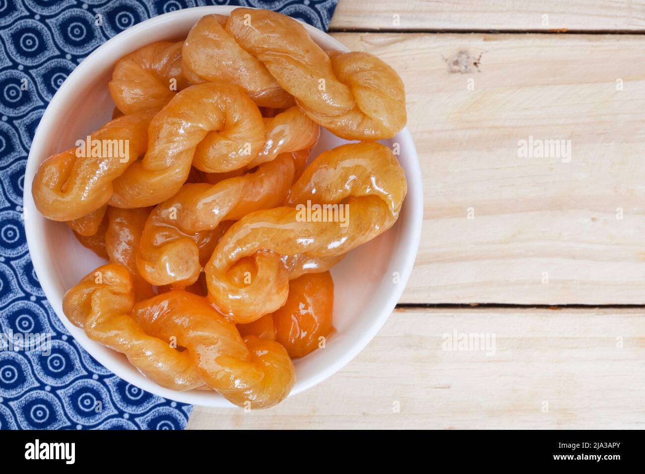 Delicious, golden, syrup drenched South African traditional koeksisters ...