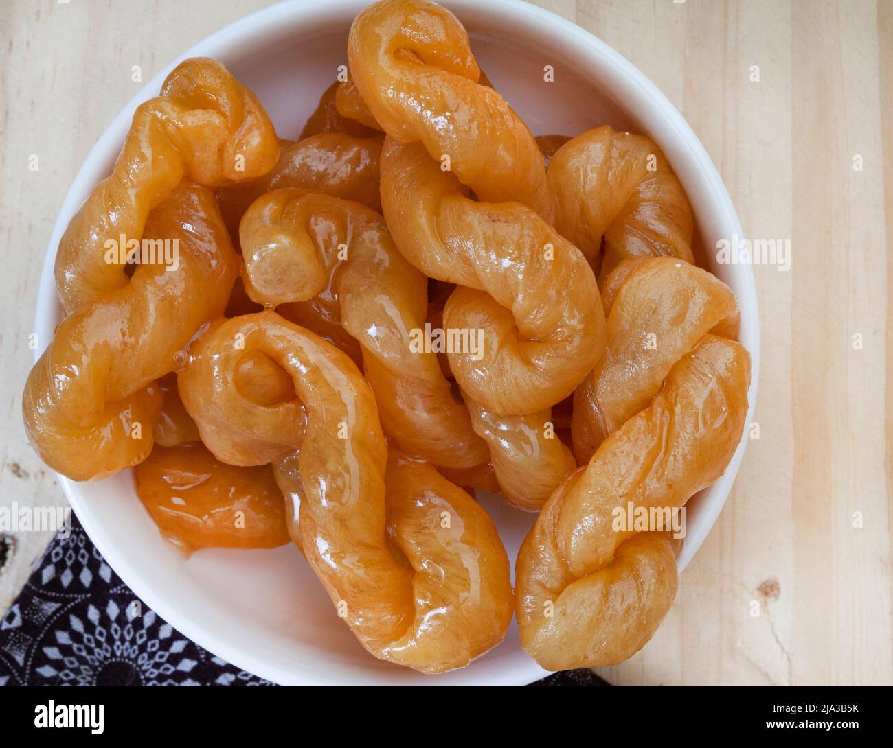 Delicious, golden, syrup drenched South African traditional koeksisters ...