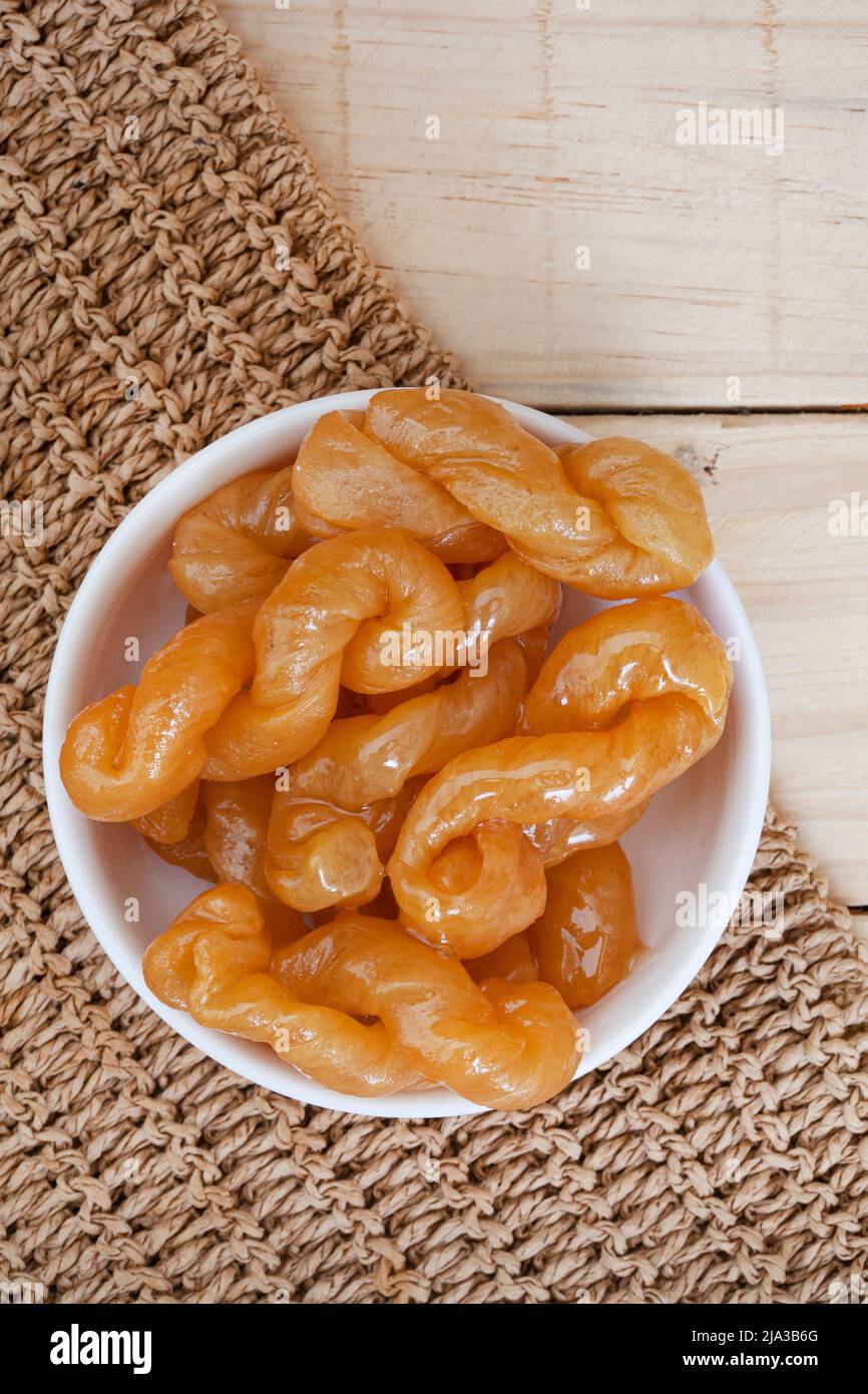 Delicious, golden, syrup drenched South African traditional koeksisters ...