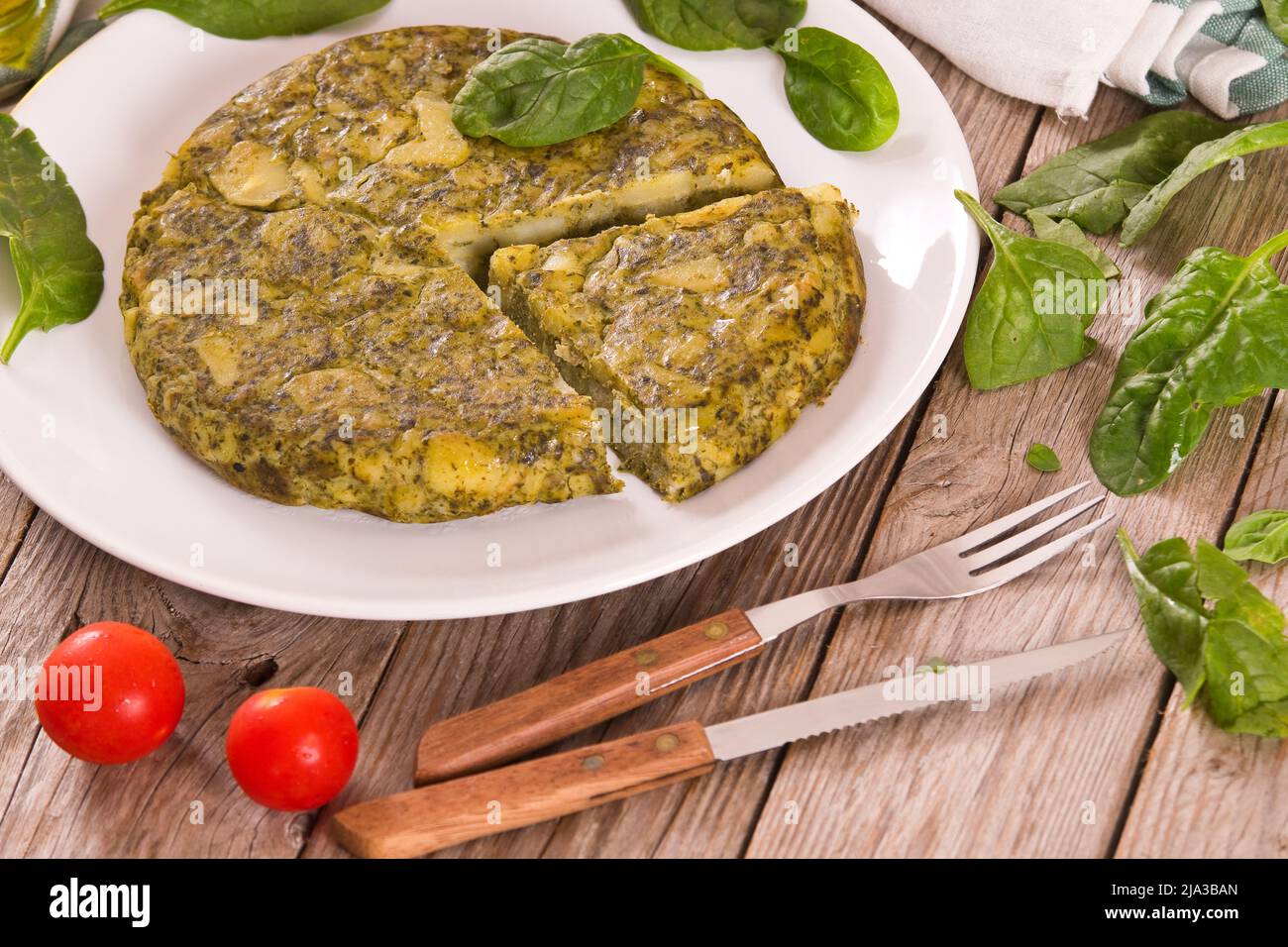 Spanish omelette with spinach Stock Photo - Alamy