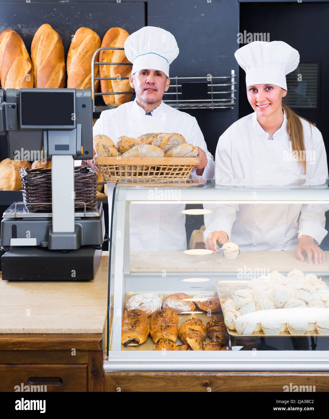 Bread bakery offering woman hi-res stock photography and images - Alamy