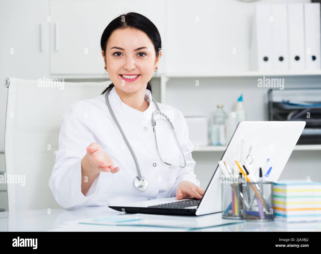 Doctor ready for clients Stock Photo - Alamy