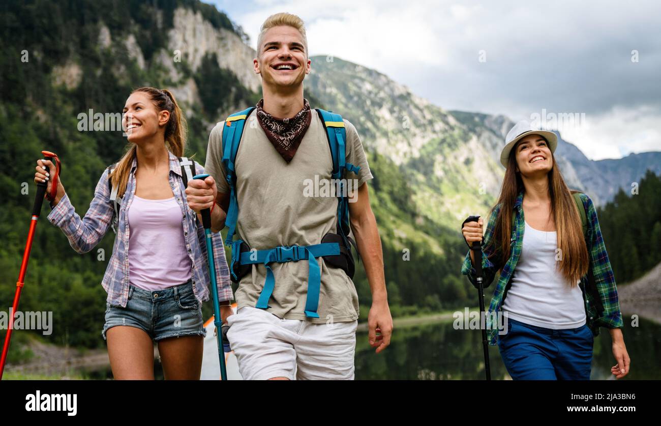 Group of happy hiker friends trekking as part of healthy lifestyle ...
