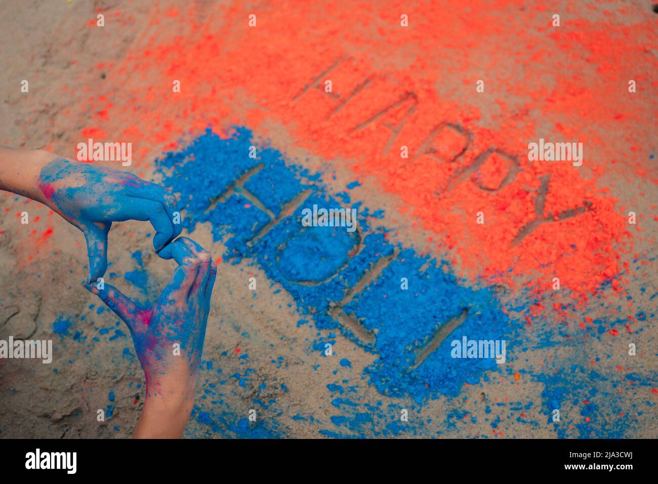 the inscription on the sand dust holly Stock Photo - Alamy