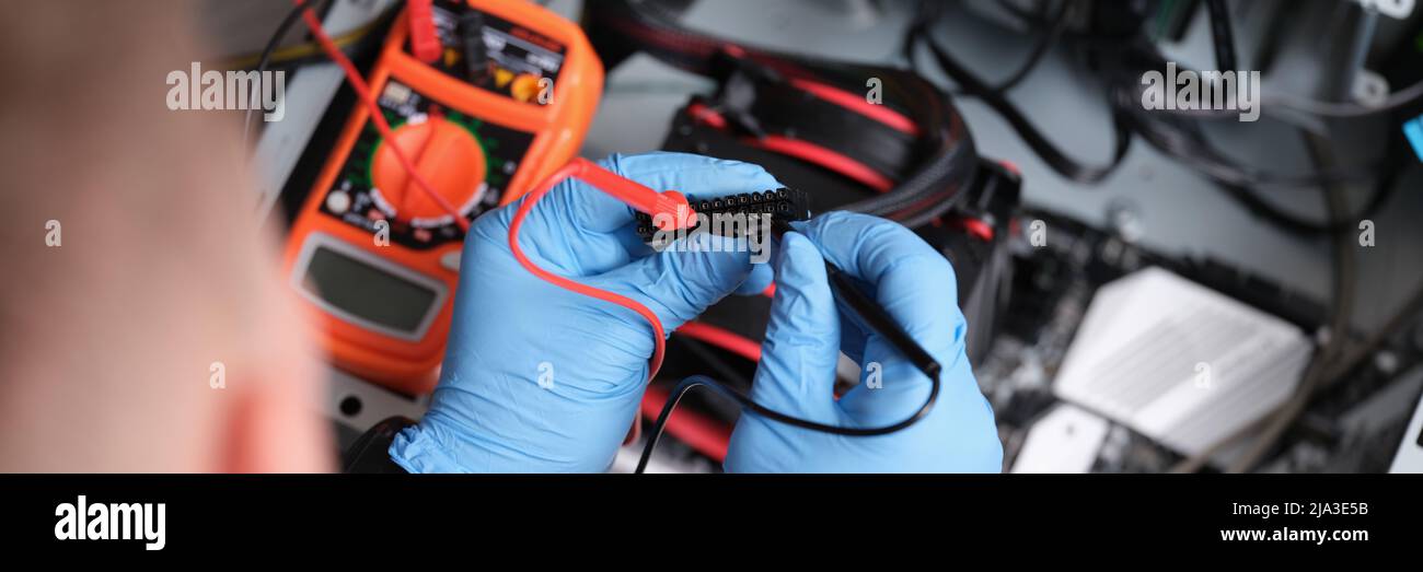 Man multimeter hi-res stock photography and images - Alamy