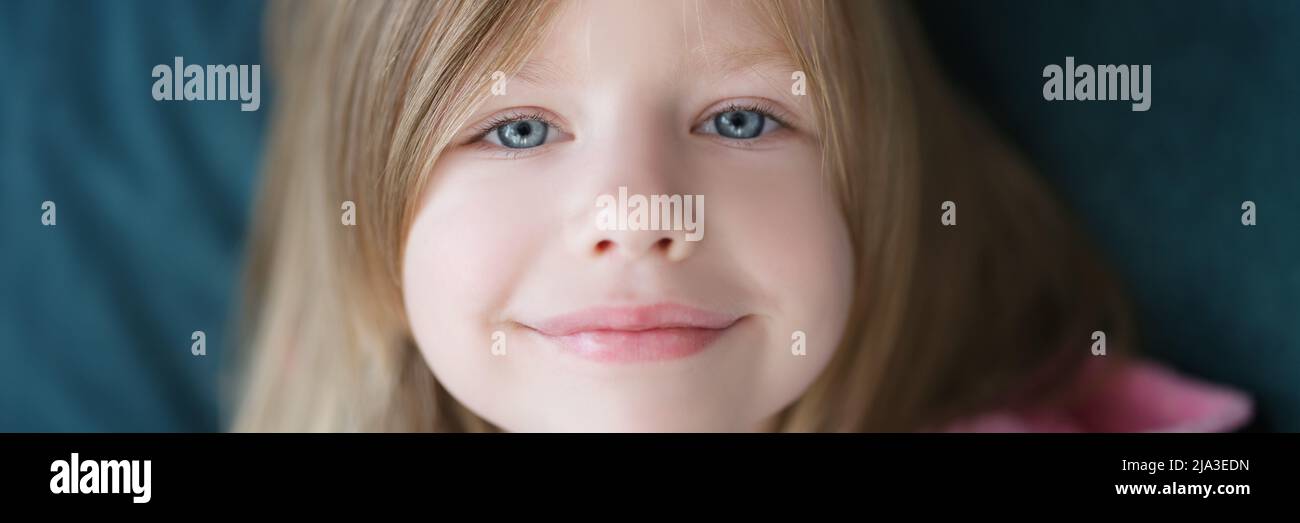Smiling face of a little cute girl, close-up Stock Photo - Alamy
