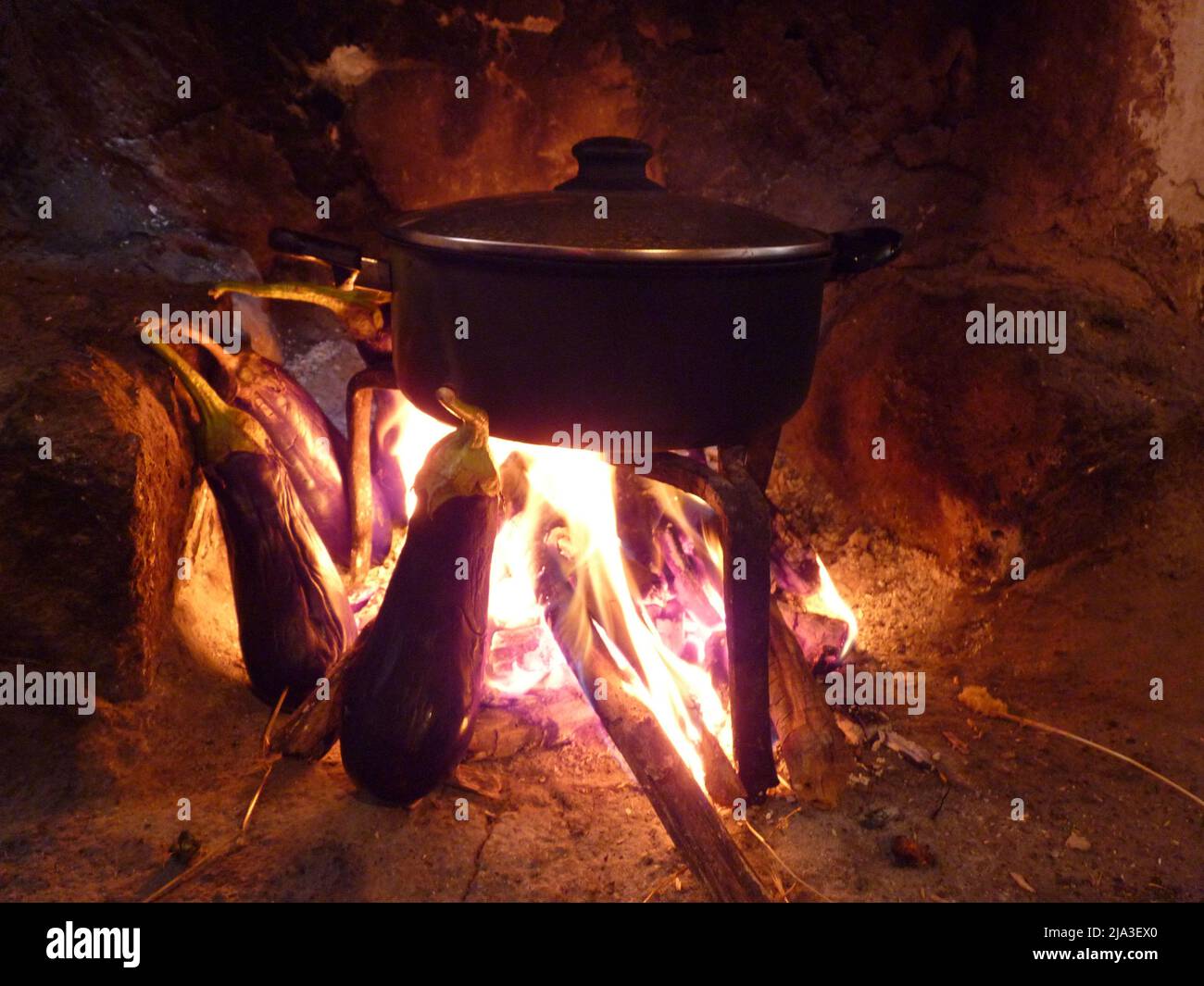 pot with food on the local fire stove Stock Photo - Alamy