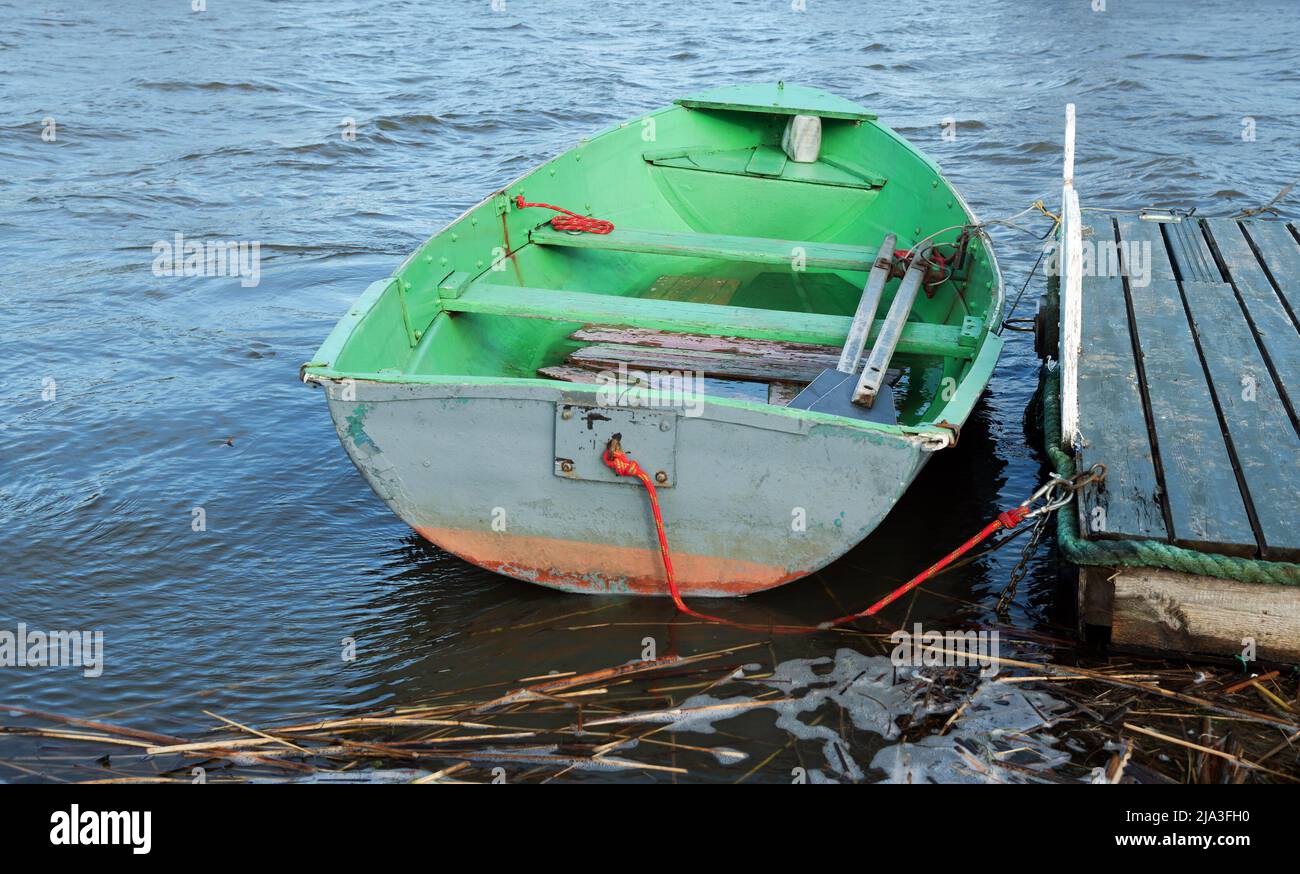 Coast of water channel with the boat Stock Photo - Alamy