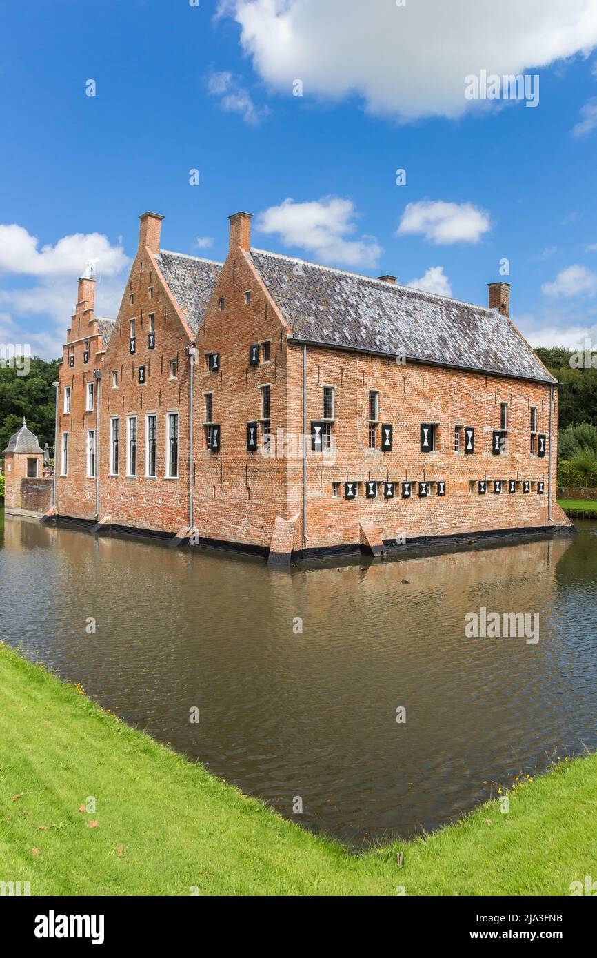 Historic Menkemaborg castle in the water in Uithuizen, Netherlands ...