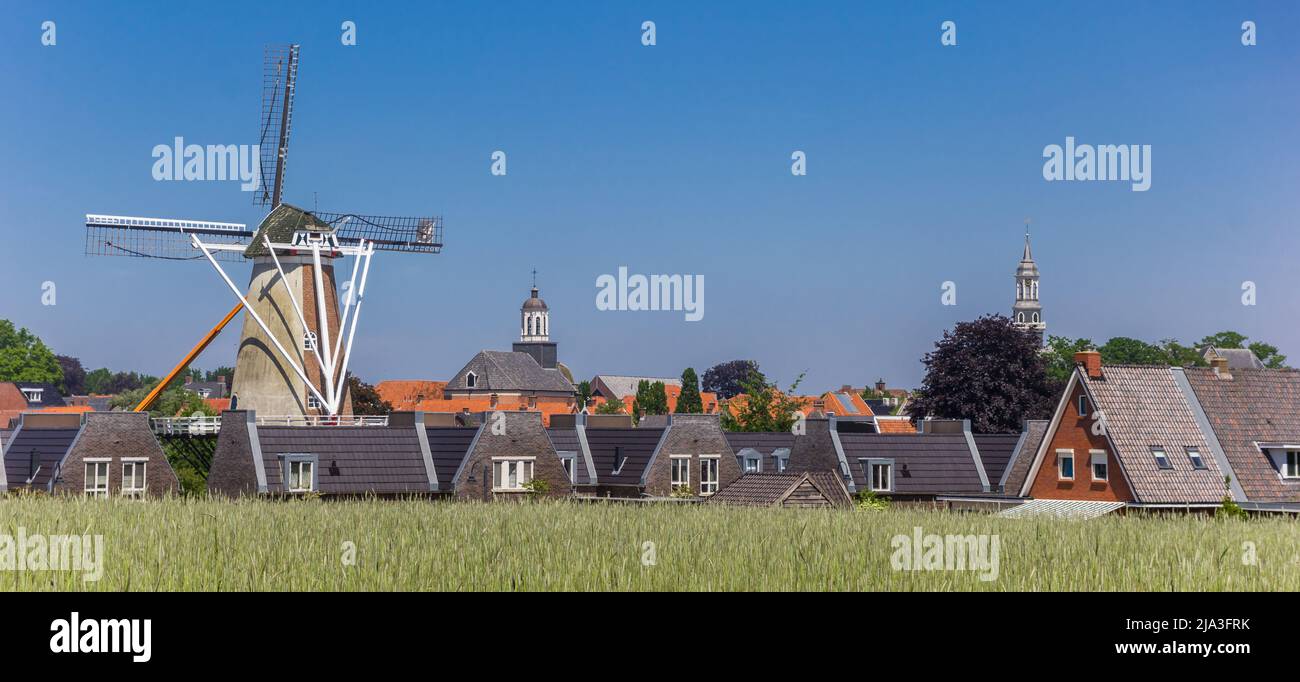 Panorama of the historic windmill and church towers in Ootmarsum ...