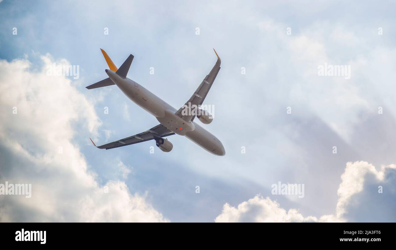 Airplane flying in the spring taking off from Italy Stock Photo - Alamy