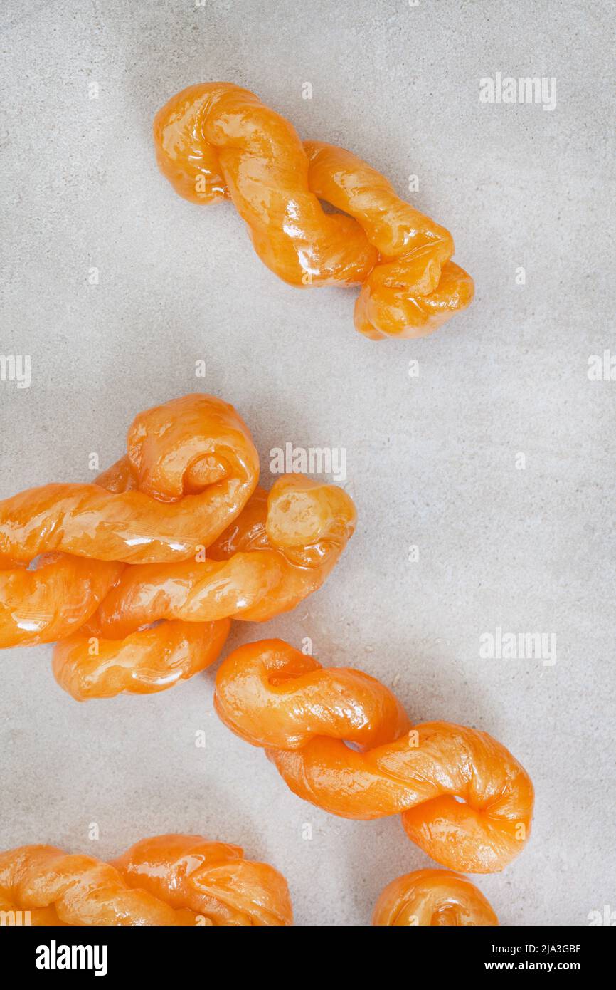 Delicious, golden, syrup drenched South African traditional koeksisters ...