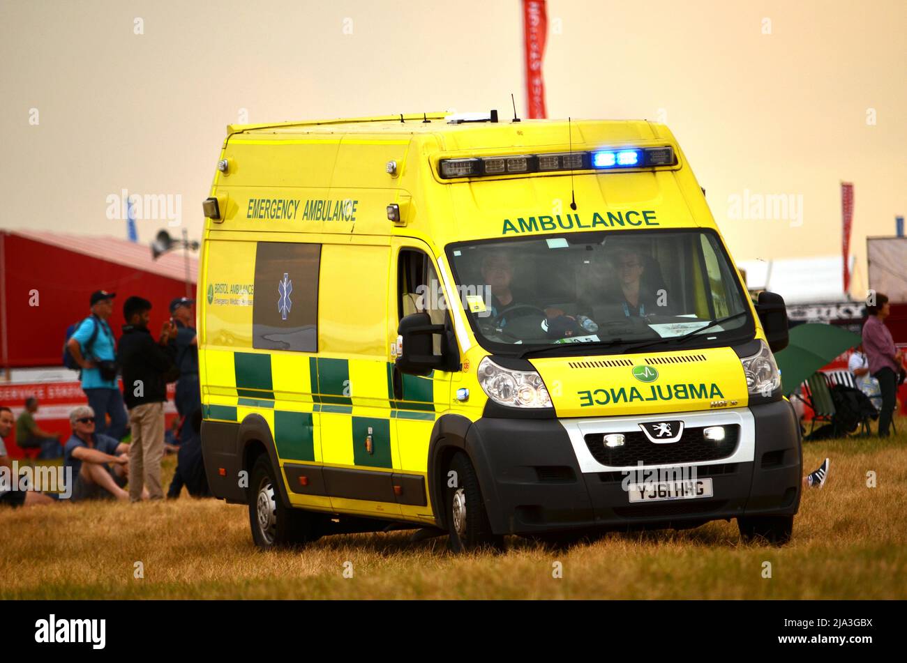 Ambulance on blue light to incident Stock Photo - Alamy