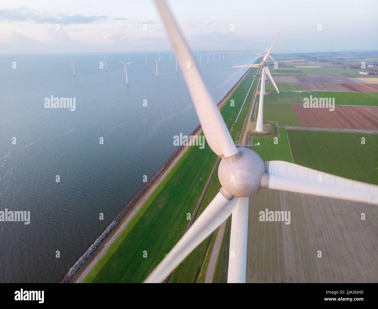 Windmill park in the ocean, drone aerial view of windmill turbines ...