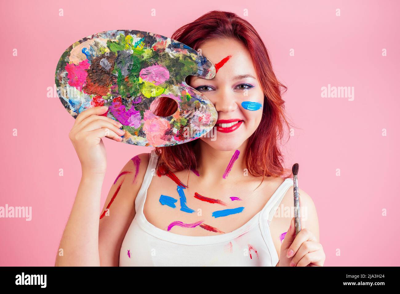 dirty visagiste make-up artist stains from paint on the face palette in ...