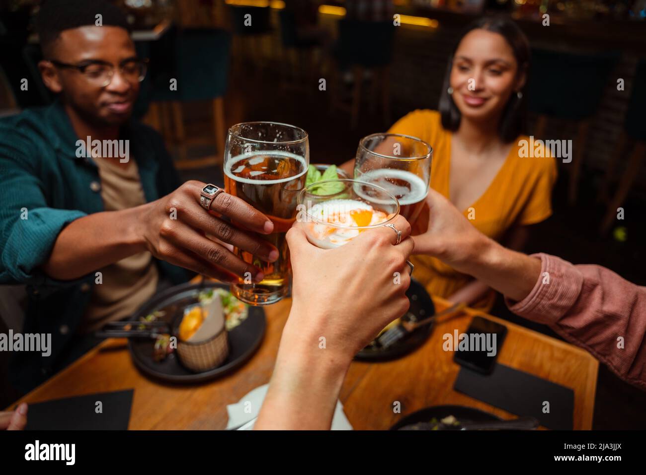 Dinner cheers woman hi-res stock photography and images - Alamy