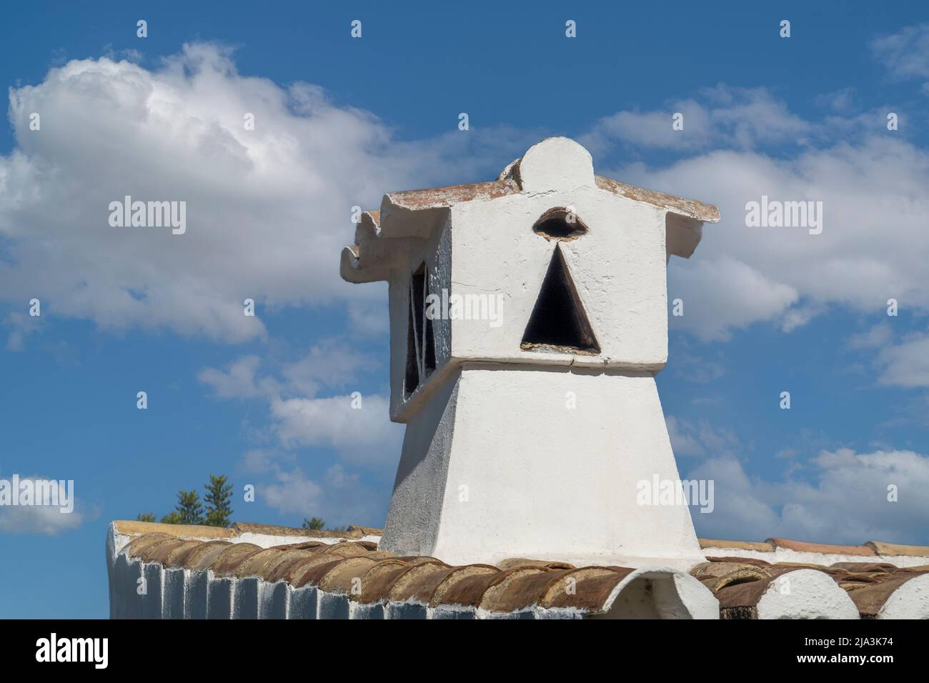 Close view of the typical traditional architecture of Algarve chimneys ...