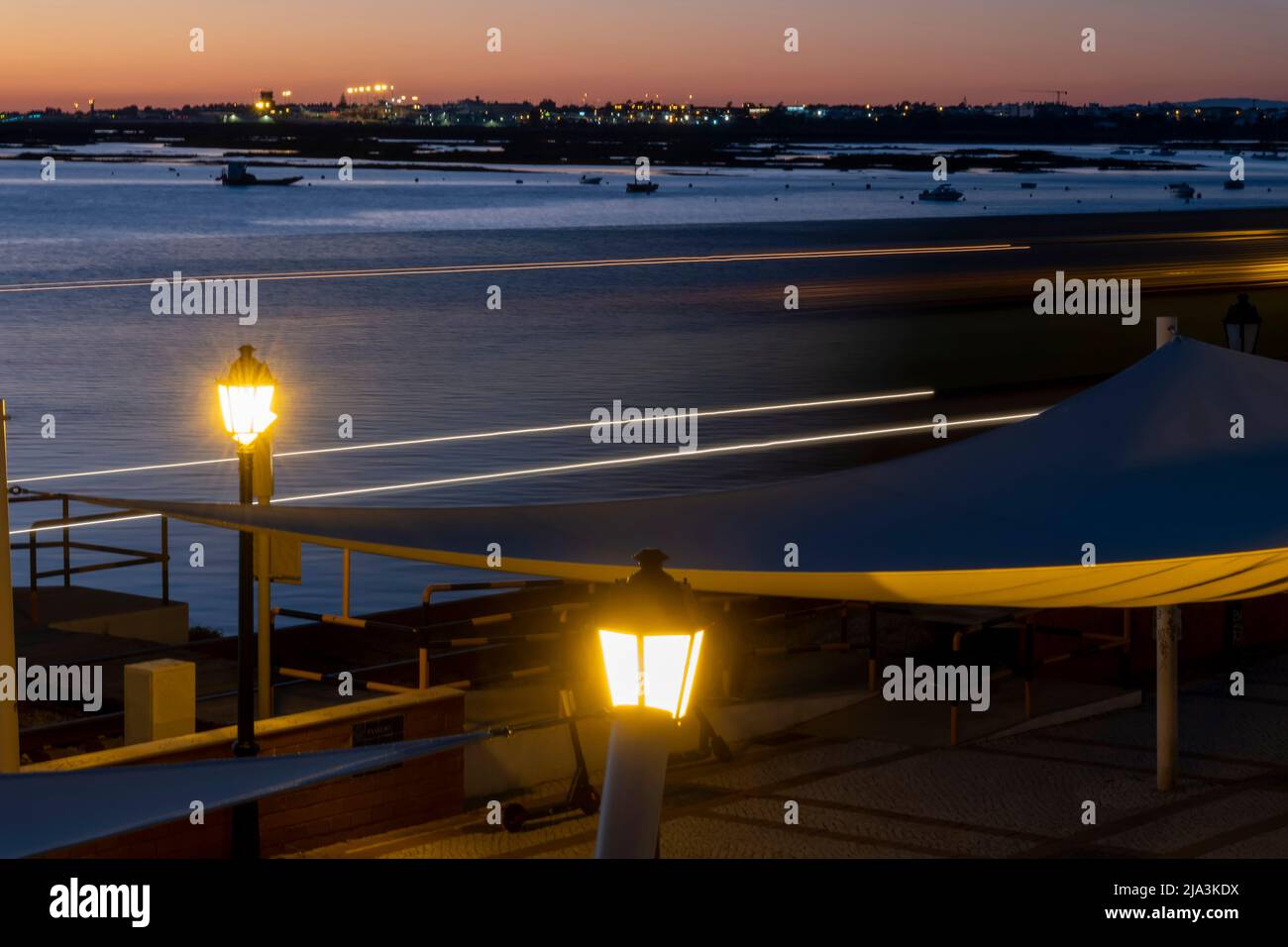 Beautiful sunset view of the marshlands of Faro city, Algarve, Portugal ...