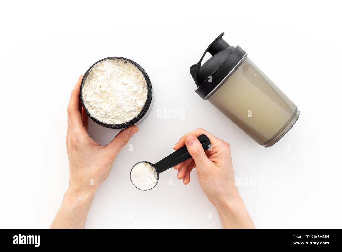 Hands making shake with whey protein. Fitness and gym diet nutrition ...