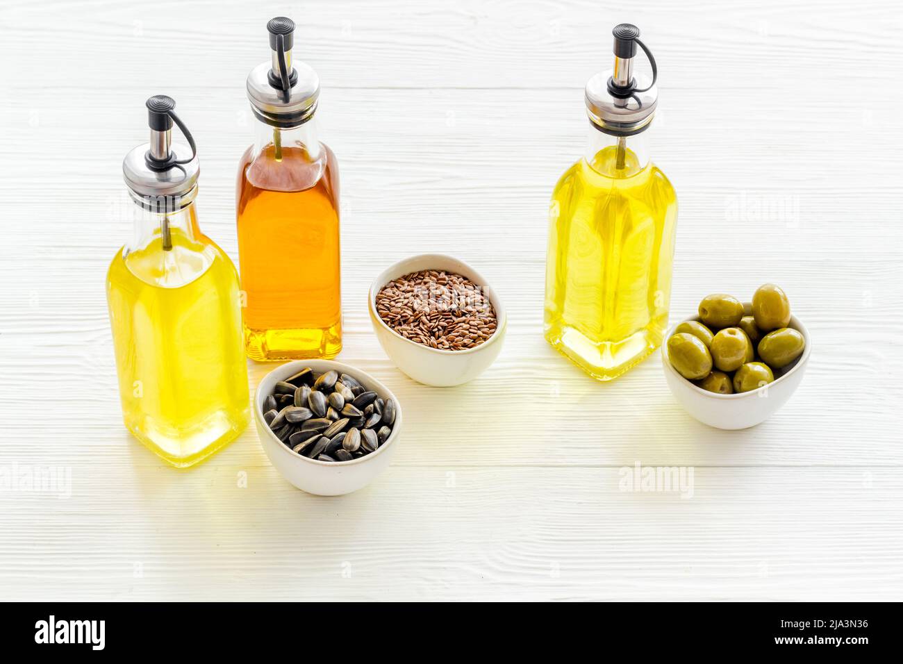 Three types of cooking oil - sunflower olive and sesame oil Stock Photo ...