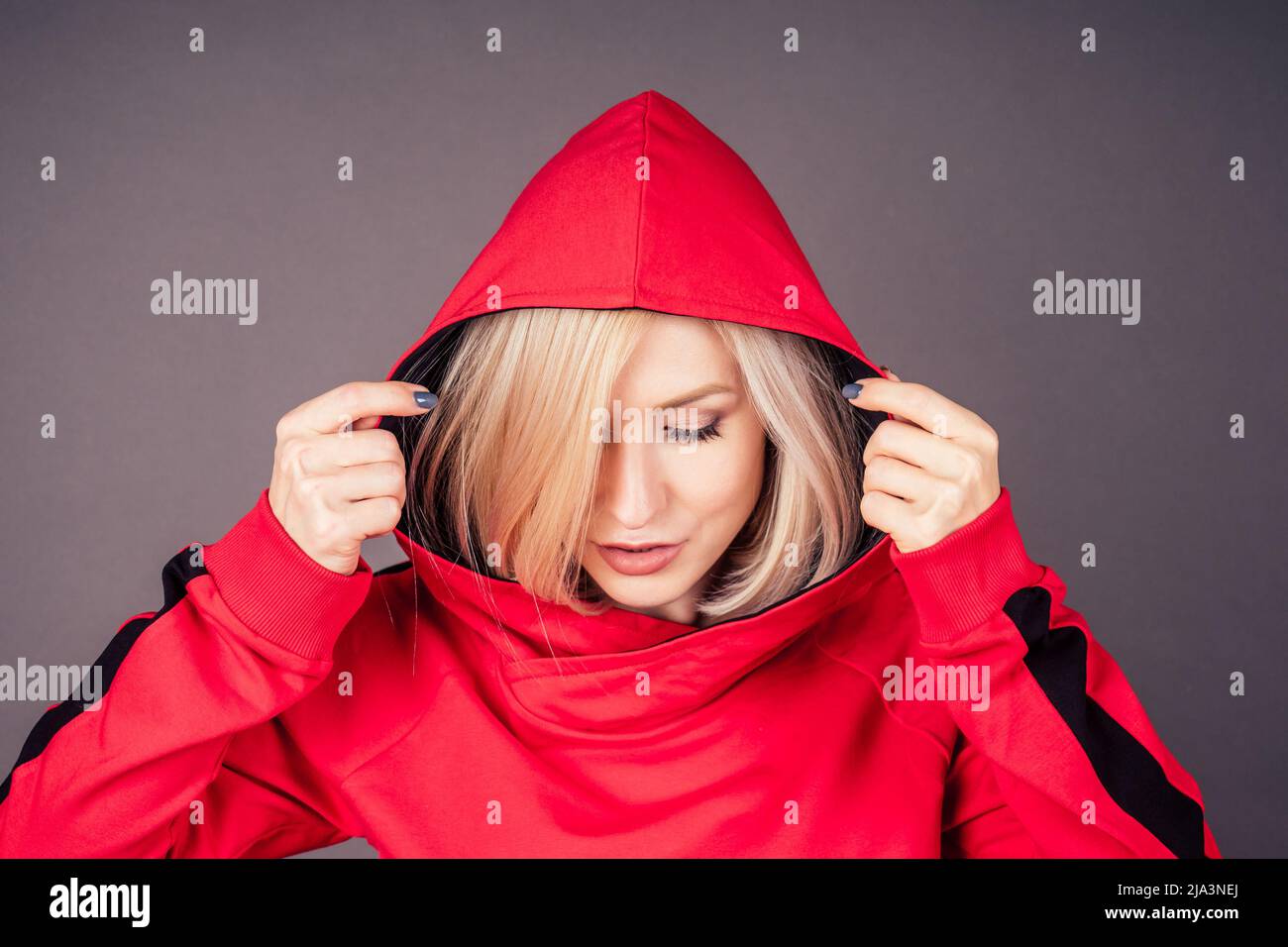Put on a hood hi-res stock photography and images - Alamy