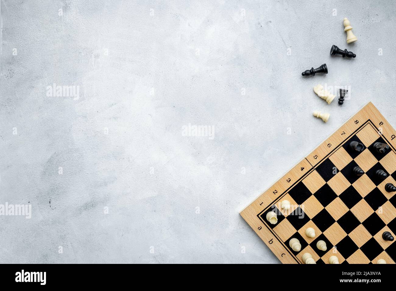 Chess pieces battle on chessboard. Teamwork concept Stock Photo - Alamy