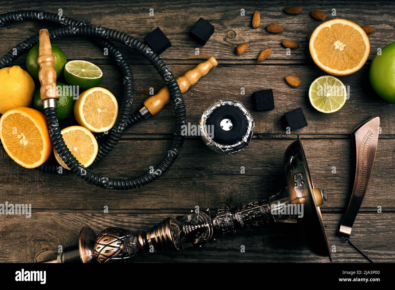 Stylish Smoking hookah and basket with lemon, lime and orange on Stock ...