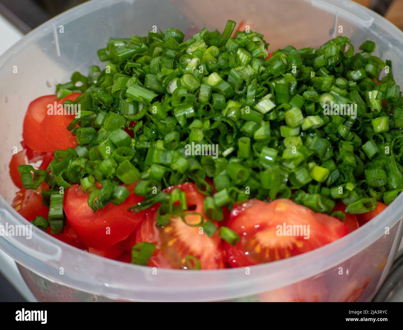 Spring salad chopped tomatoes hi-res stock photography and images - Alamy