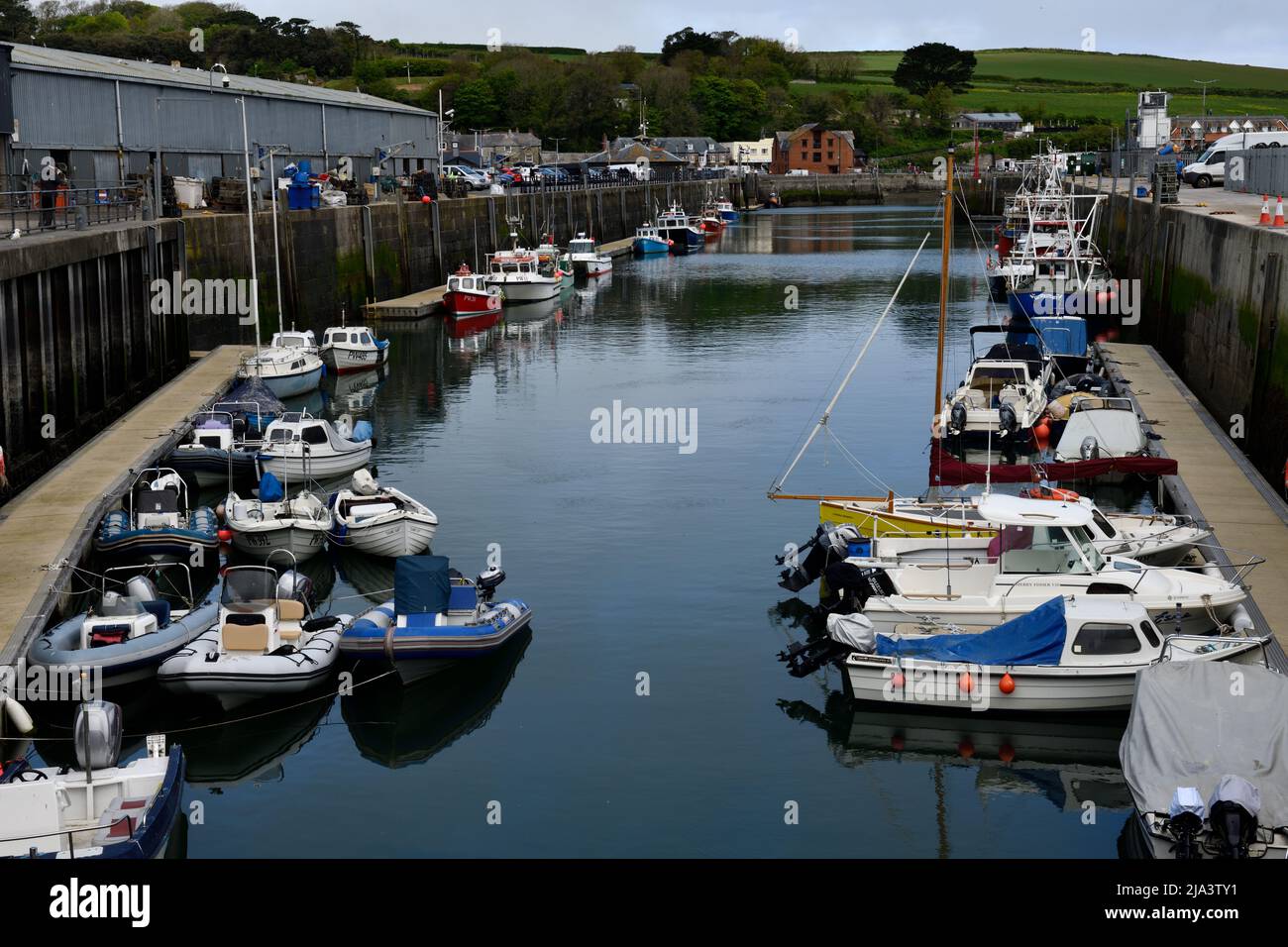 Padstow Harbour with the Tide in Cornwall England uk Stock Photo - Alamy