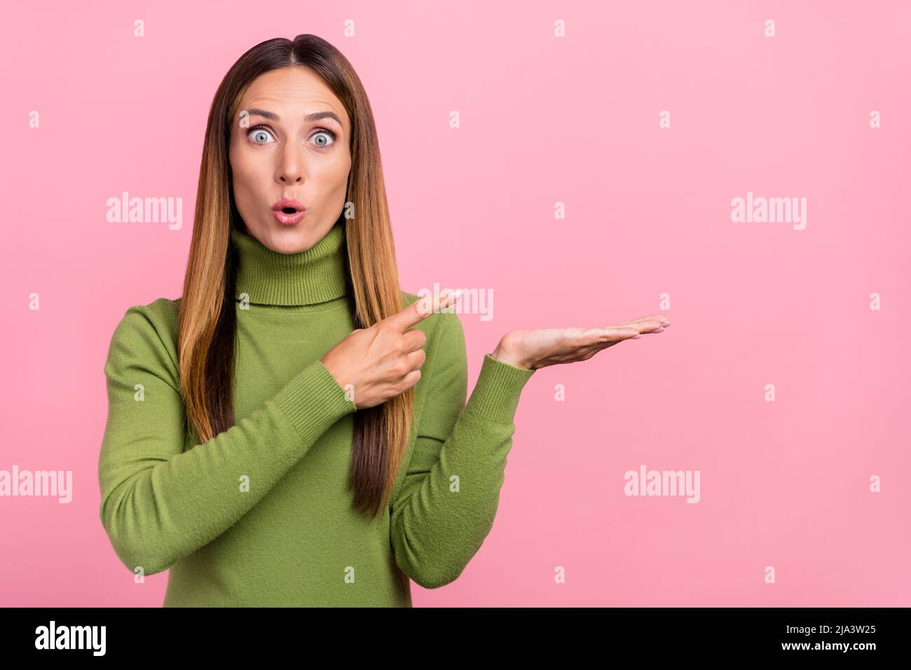 Photo of amazed lady promoter demonstrate empty space promo ads ...