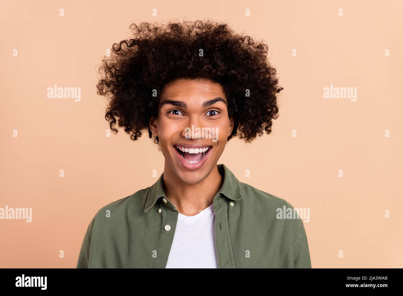 Portrait of attractive crazy cheerful wavy-haired guy laughing having ...