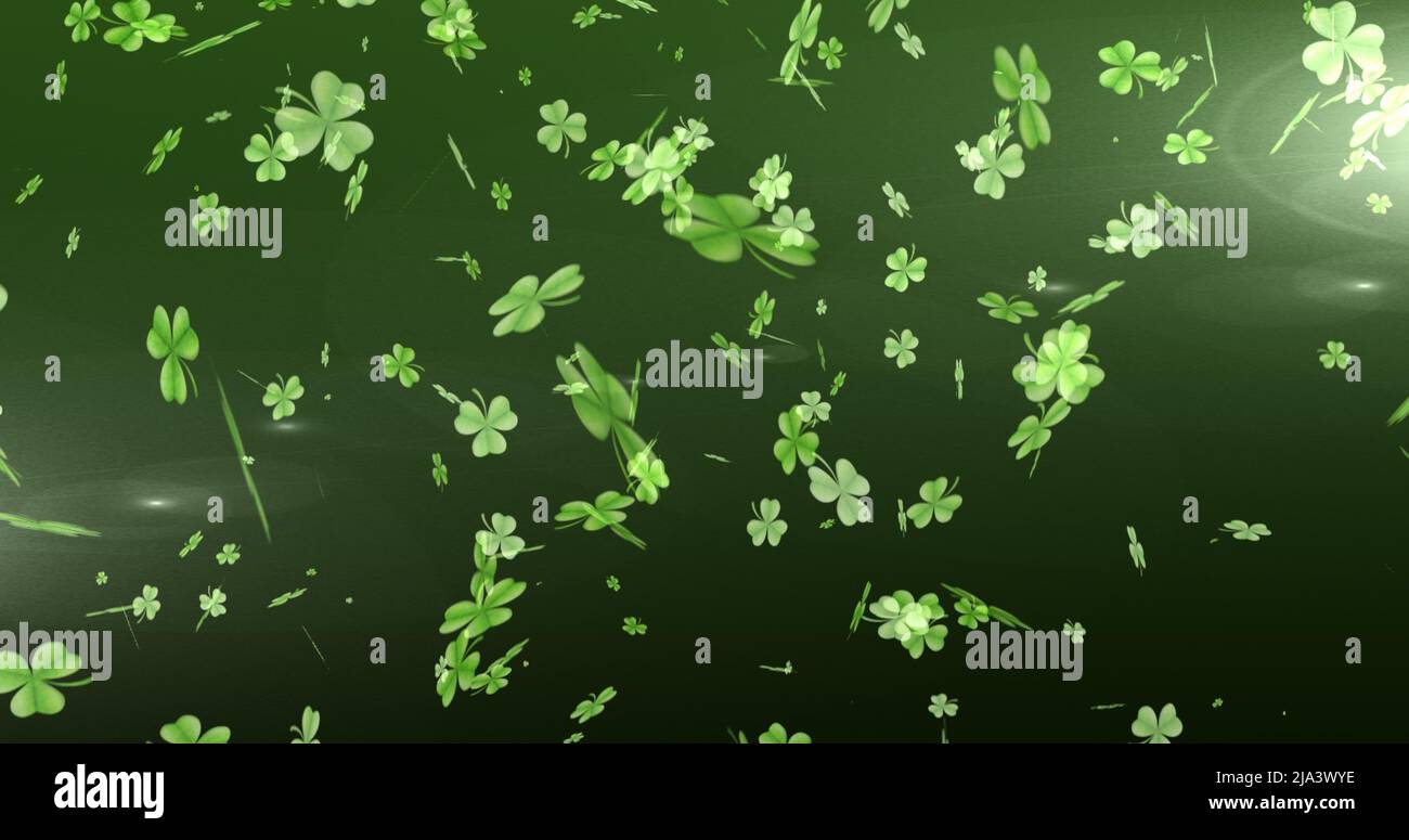 Image multiple floating green shamrocks Stock Photo - Alamy
