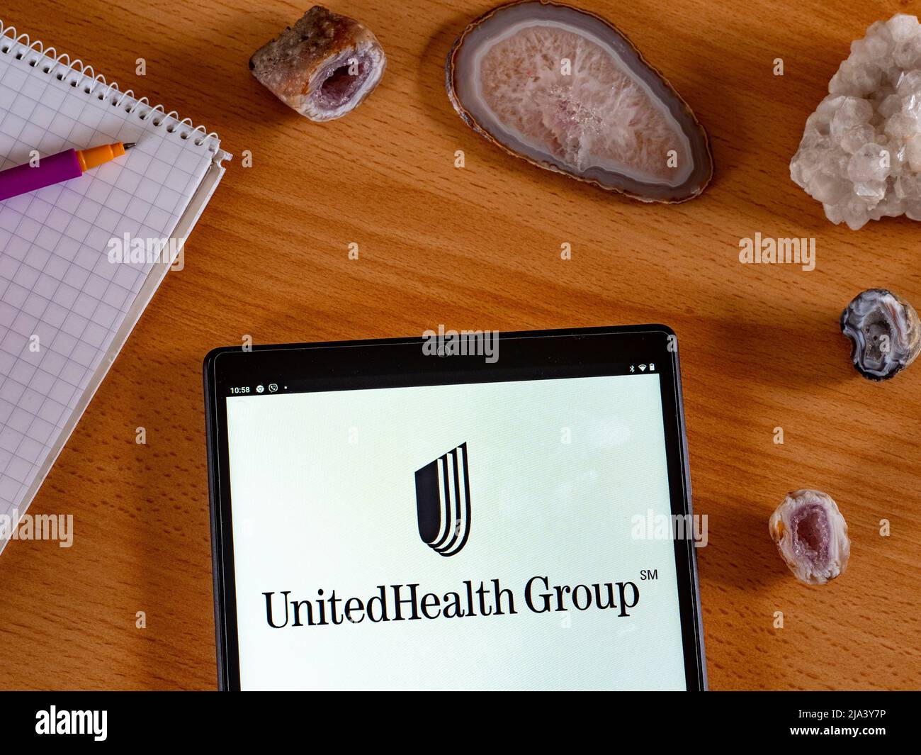 In this photo illustration UnitedHealth Group logo seen displayed on a ...