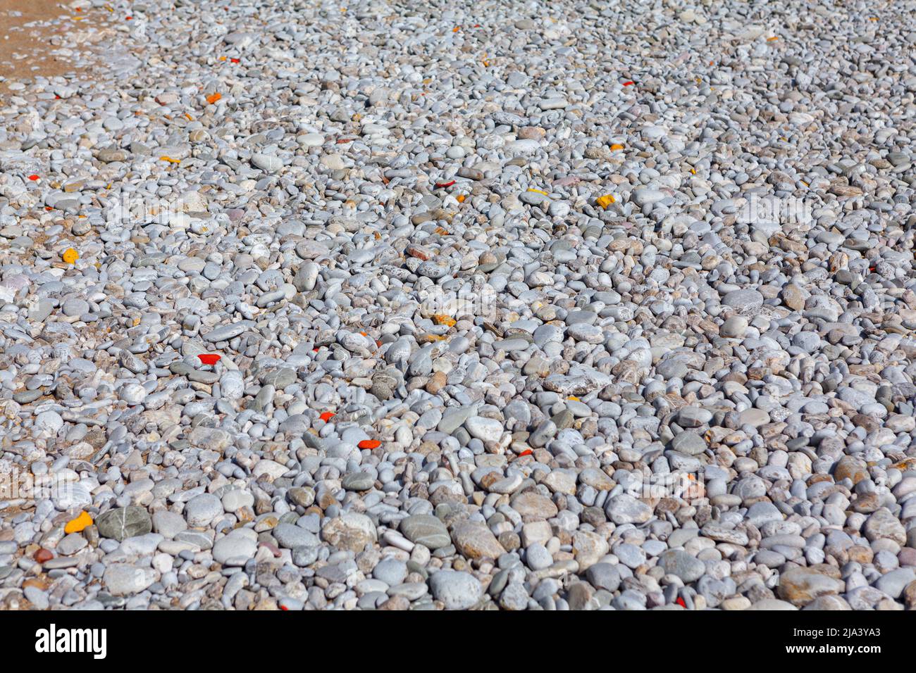 Coastal pebble background . Pebbles stones on the beach Stock Photo - Alamy