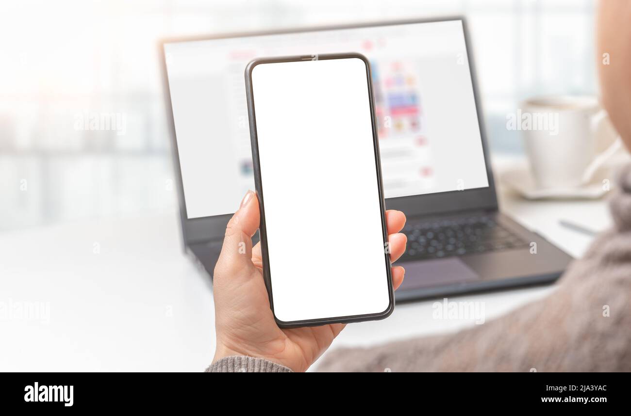 Mockup cellphone. Woman hand holding phone with blank screen in modern ...